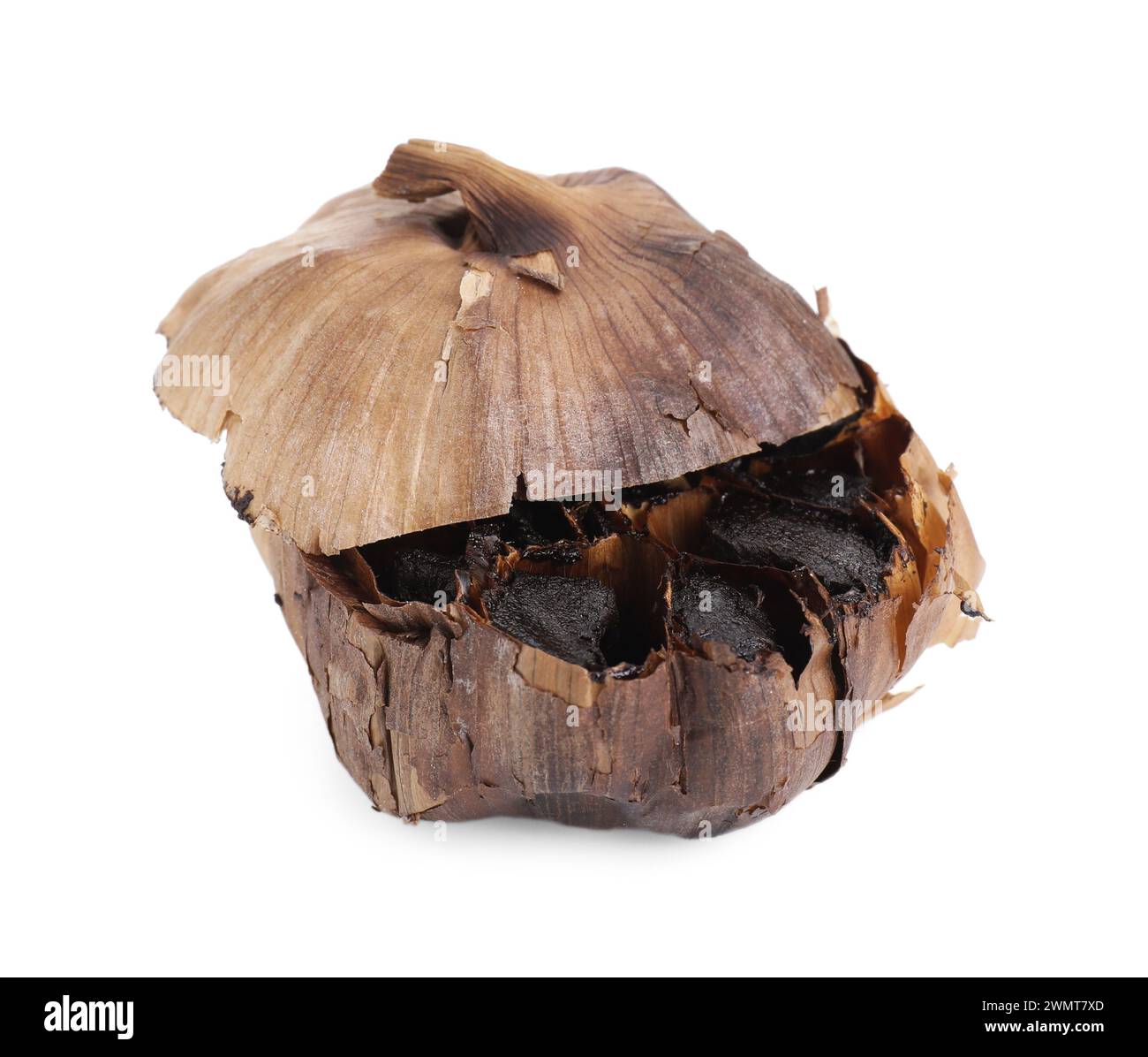 Black fermented garlic on white Cut Out Stock Images & Pictures - Alamy