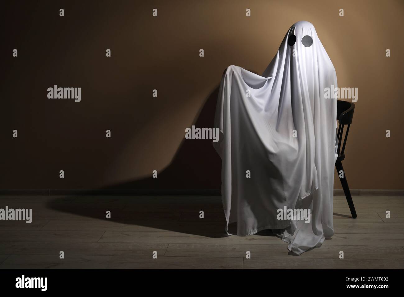 Monster sitting on chair hi-res stock photography and images - Alamy
