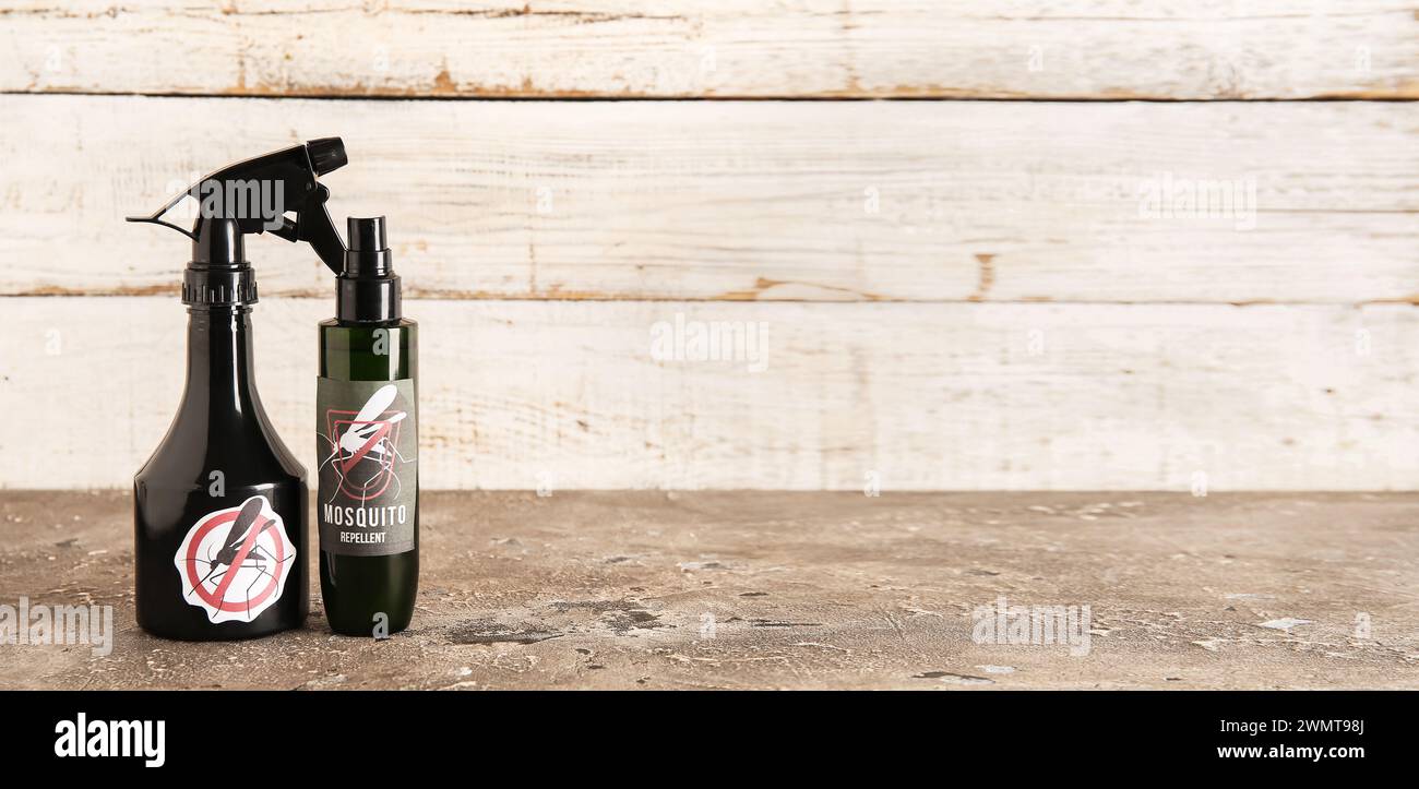 Mosquito repellent sprays on table. Banner for design Stock Photo - Alamy