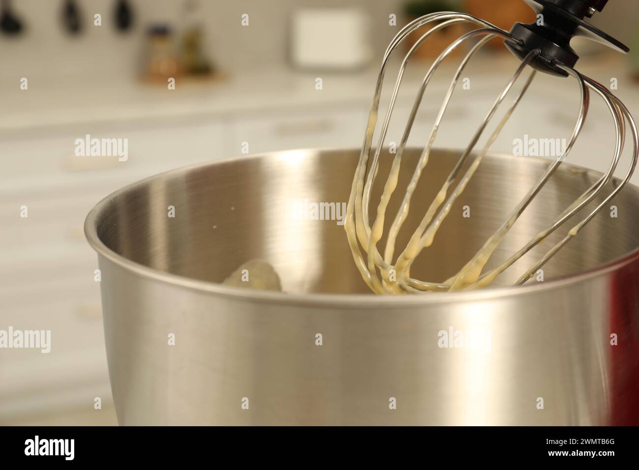 Mixing cream mixer in container hi-res stock photography and images - Alamy