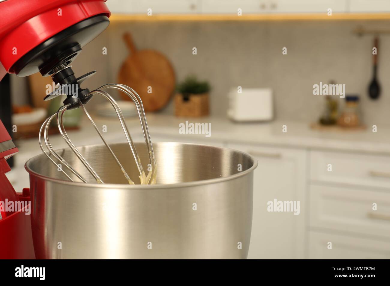 Mixing cream mixer in container hi-res stock photography and images - Alamy
