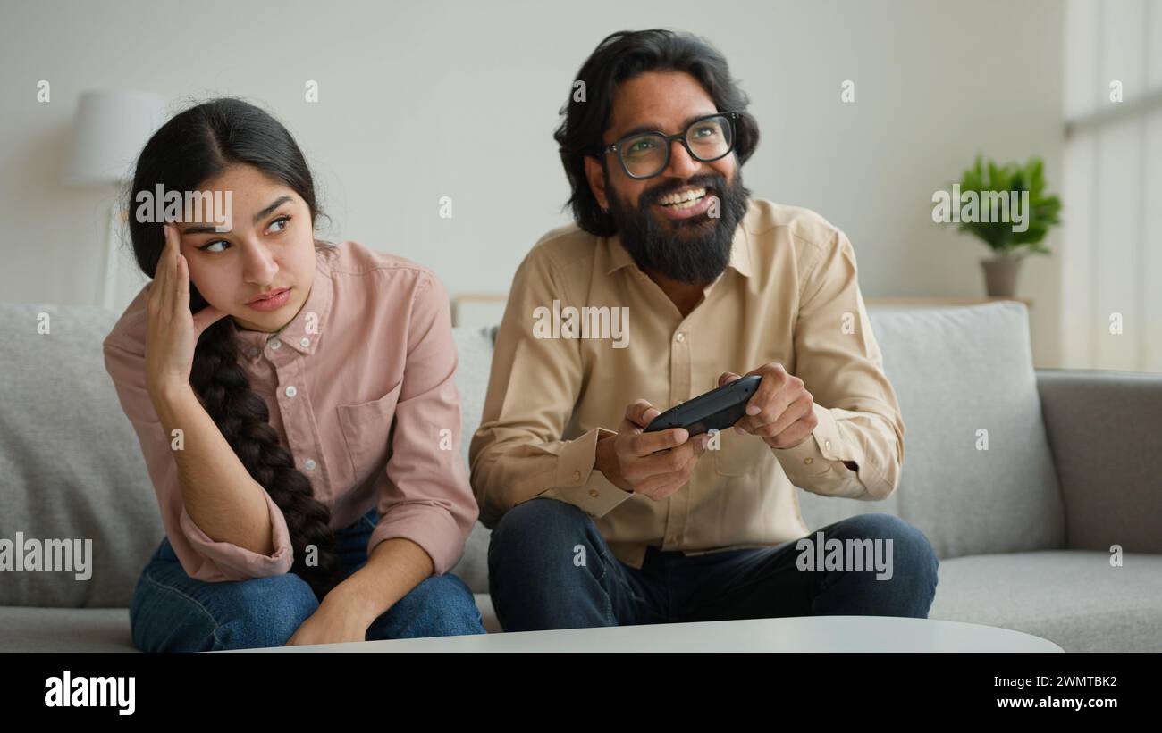 Diverse multiethnic couple at home bored angry arabian woman offend on ...