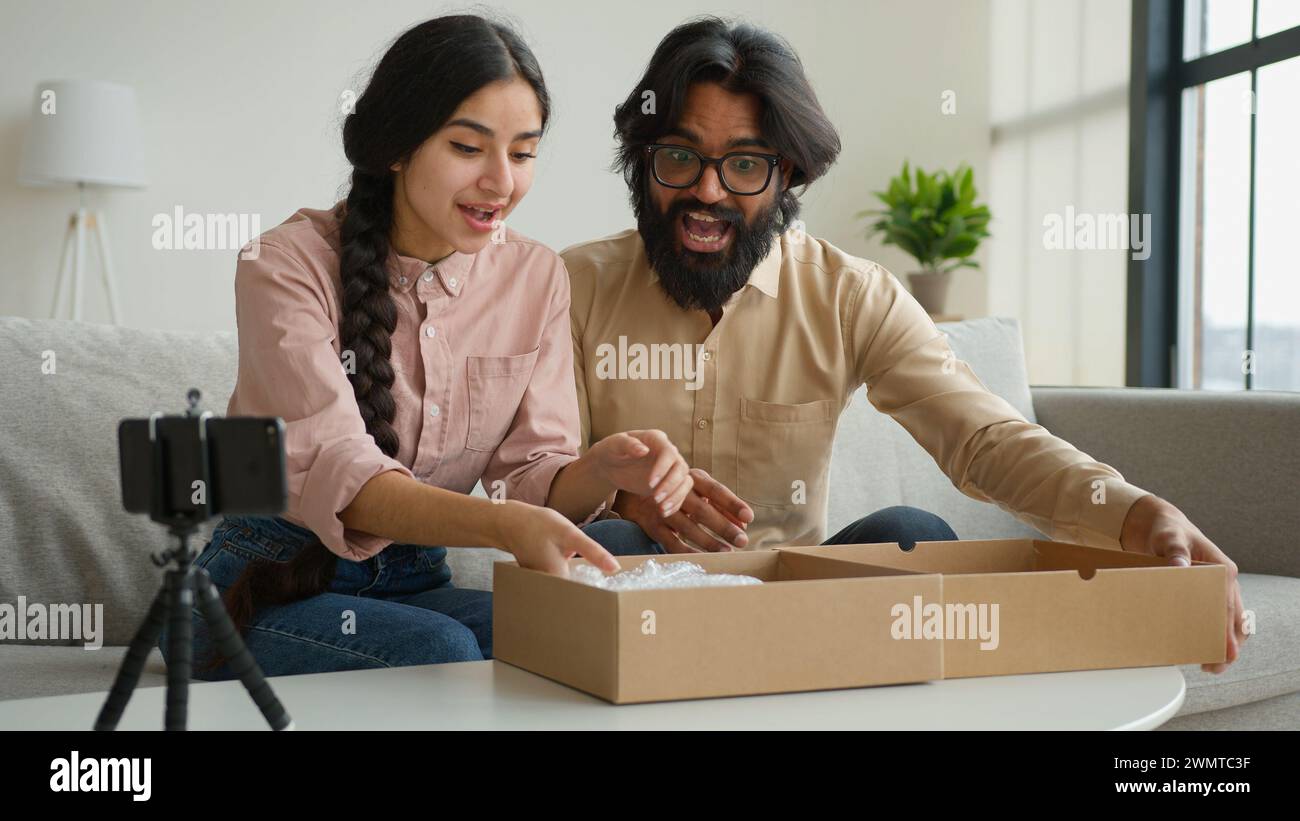 Video happy diverse couple unpacking hi-res stock photography and ...