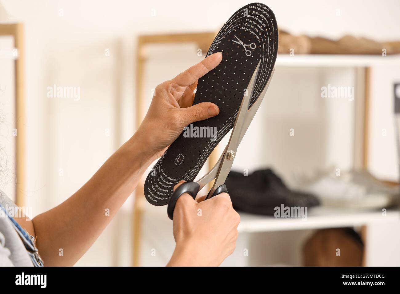 Female shoemaker table in hi-res stock photography and images - Alamy