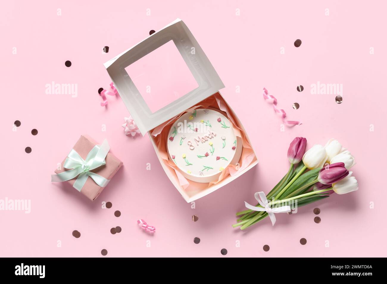 Sweet bento cake with gift box and bouquet of beautiful tulips on pink ...