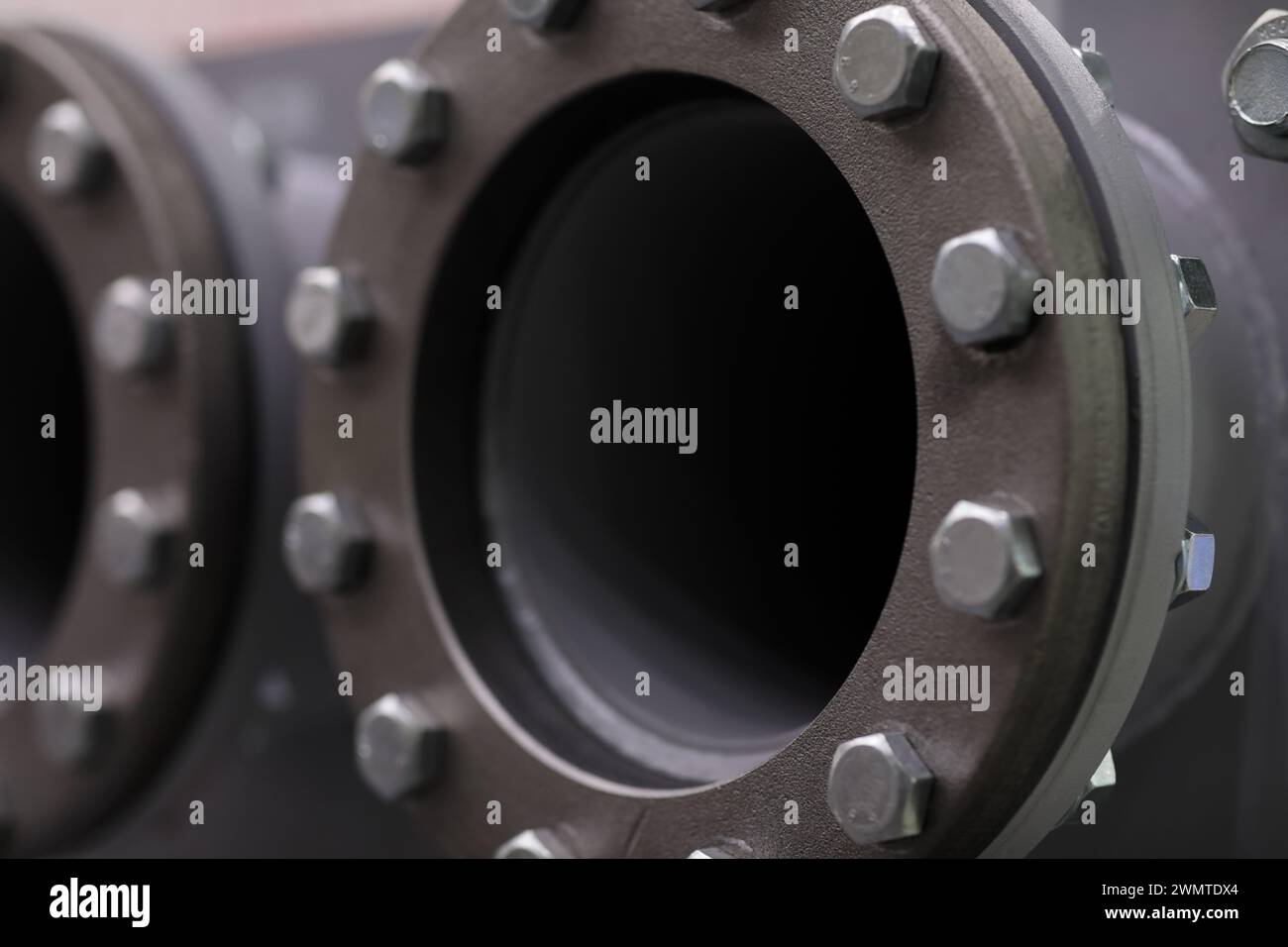 Large steel pipes with flanges for bolted connections. Industrial ...