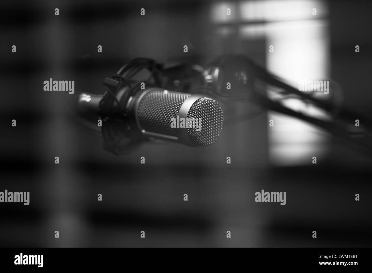 condenser microphone on a boom arm for podcasting Stock Photo - Alamy