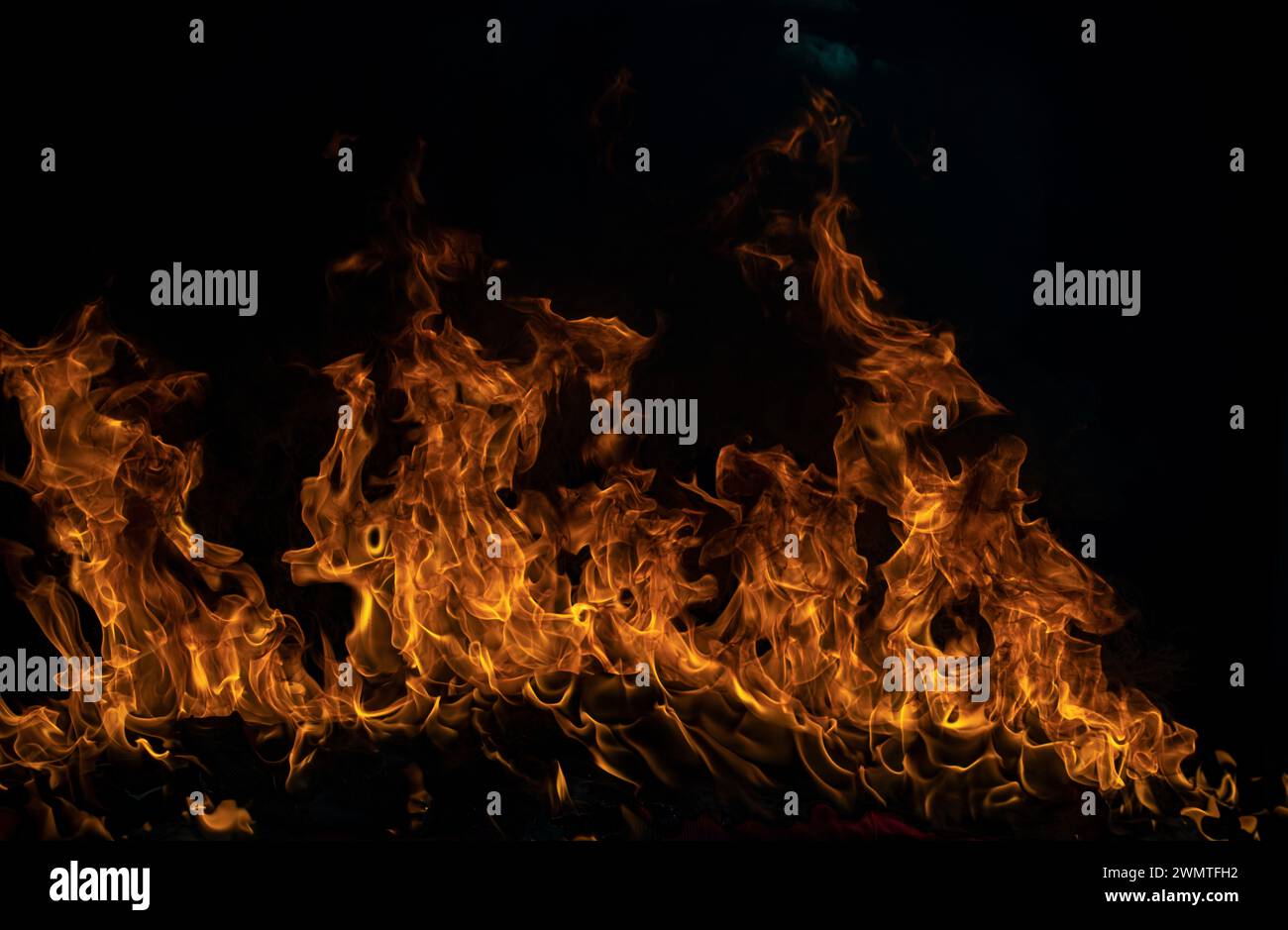 Texture of fire on a black background. Abstract fire flame background ...