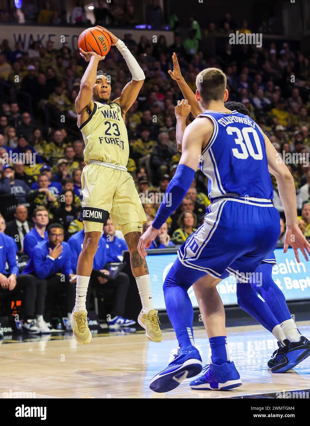 February 24, 2024: Wake Forest junior Hunter Sallis (23) shoots a jump ...