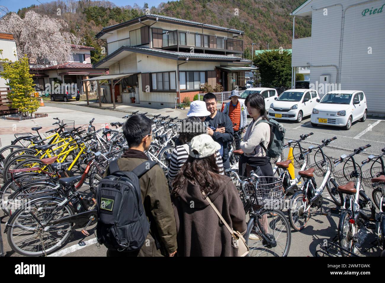 Fujikawaguchiko, Yamanashi, Japan, tourists hire bicycles from a bike ...