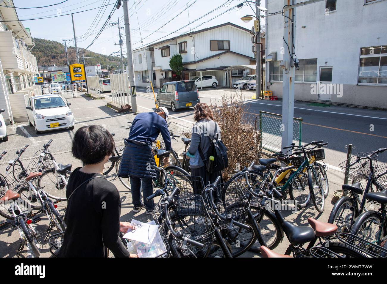 Fujikawaguchiko, Yamanashi, Japan, tourists hire bicycles from a bike ...