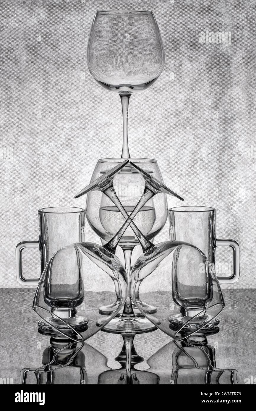 Still life with glassware on a reflective surface Stock Photo - Alamy