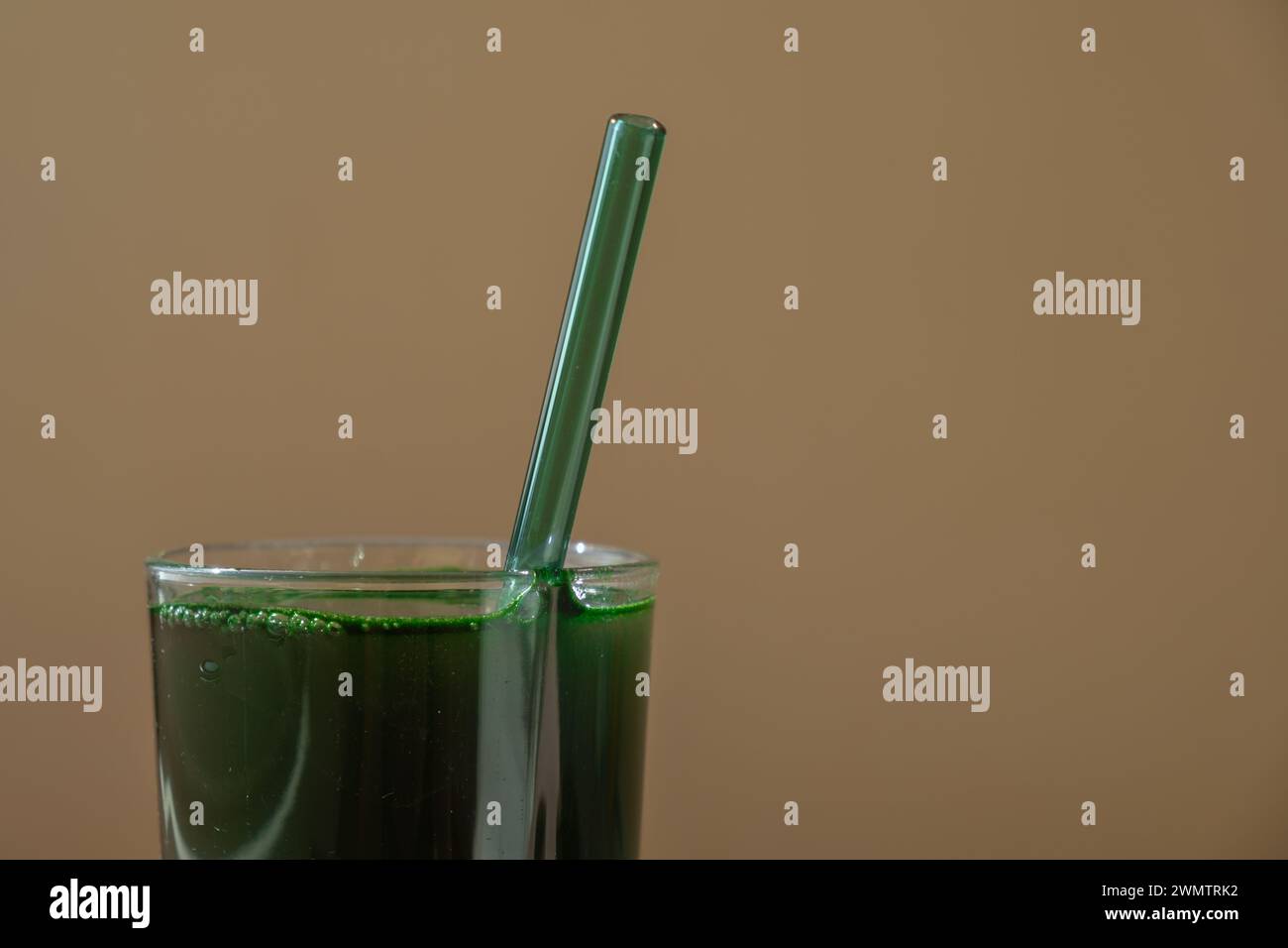 Organic blue-green algae spirulina detox drink in glass powder food ...