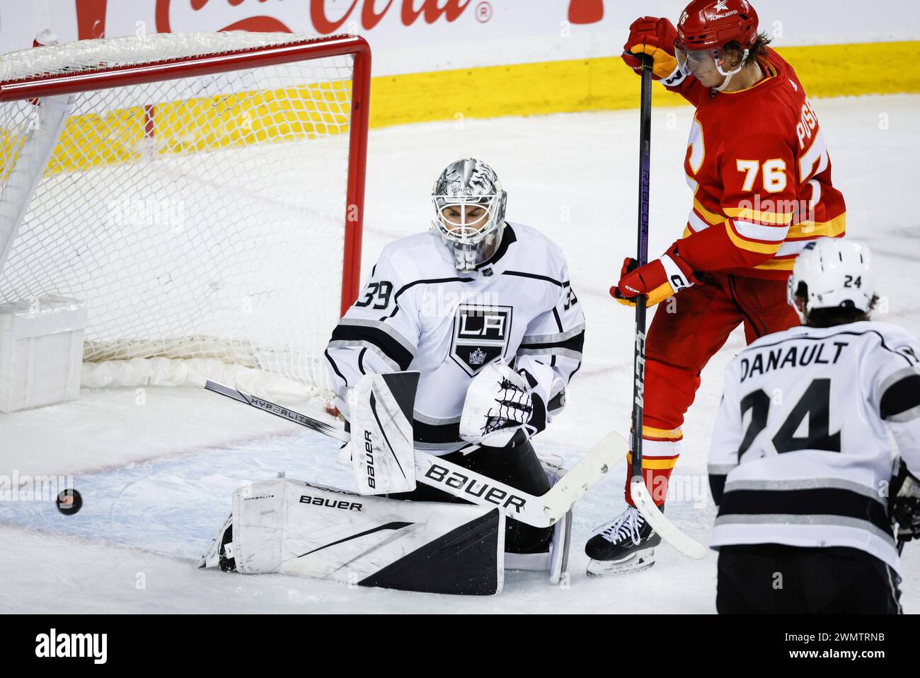Los Angeles Kings goalie Cam Talbot (39) stops a shot from Calgary ...