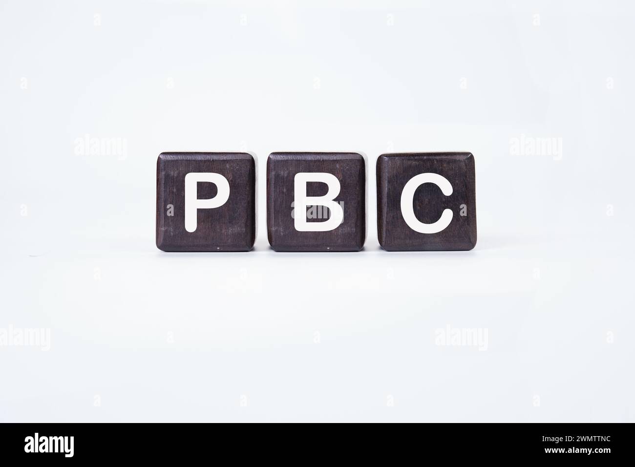 PBC Primary biliary cholangitis word on cubes on a white background ...