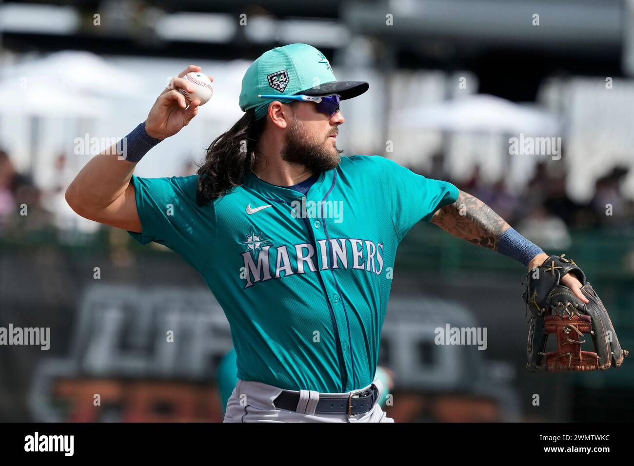 Seattle Mariners third baseman Michael Chavis warms up during the first ...