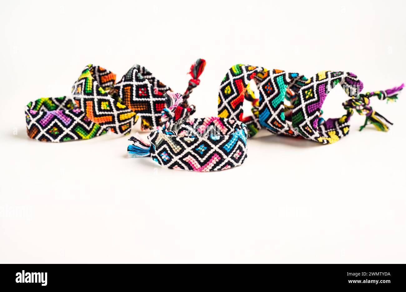 Multicolored woven DIY friendship bracelets handmade of embroidery ...