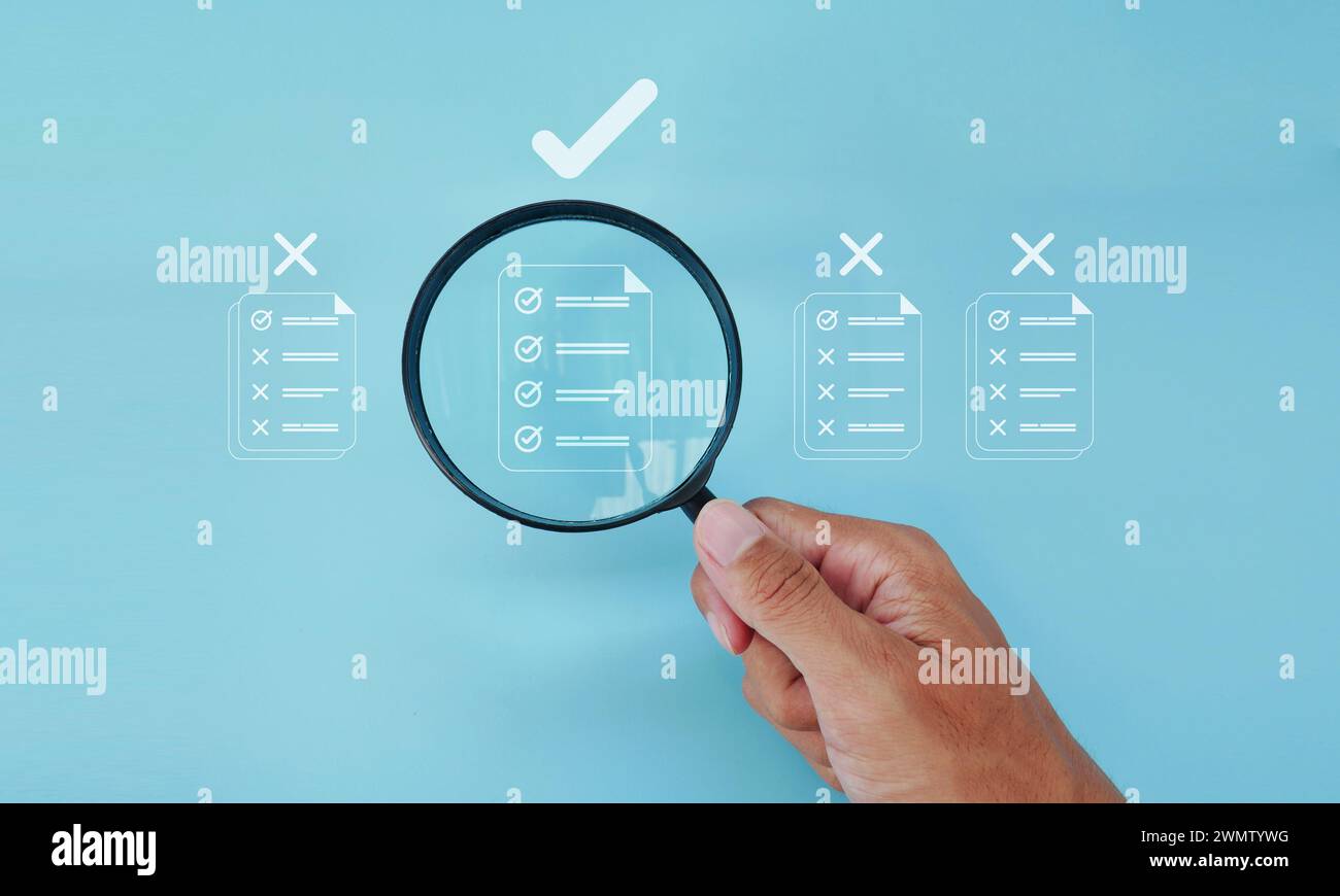 Quality Certificate and Checklist documents examined with a magnifying ...