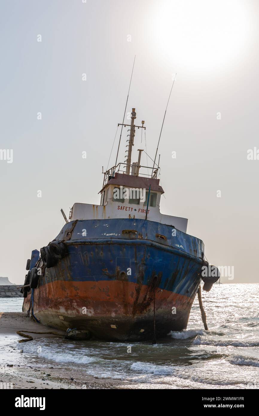 Cargo ship wreck washed ashore on the Al Hamriyah beach in Umm Al ...