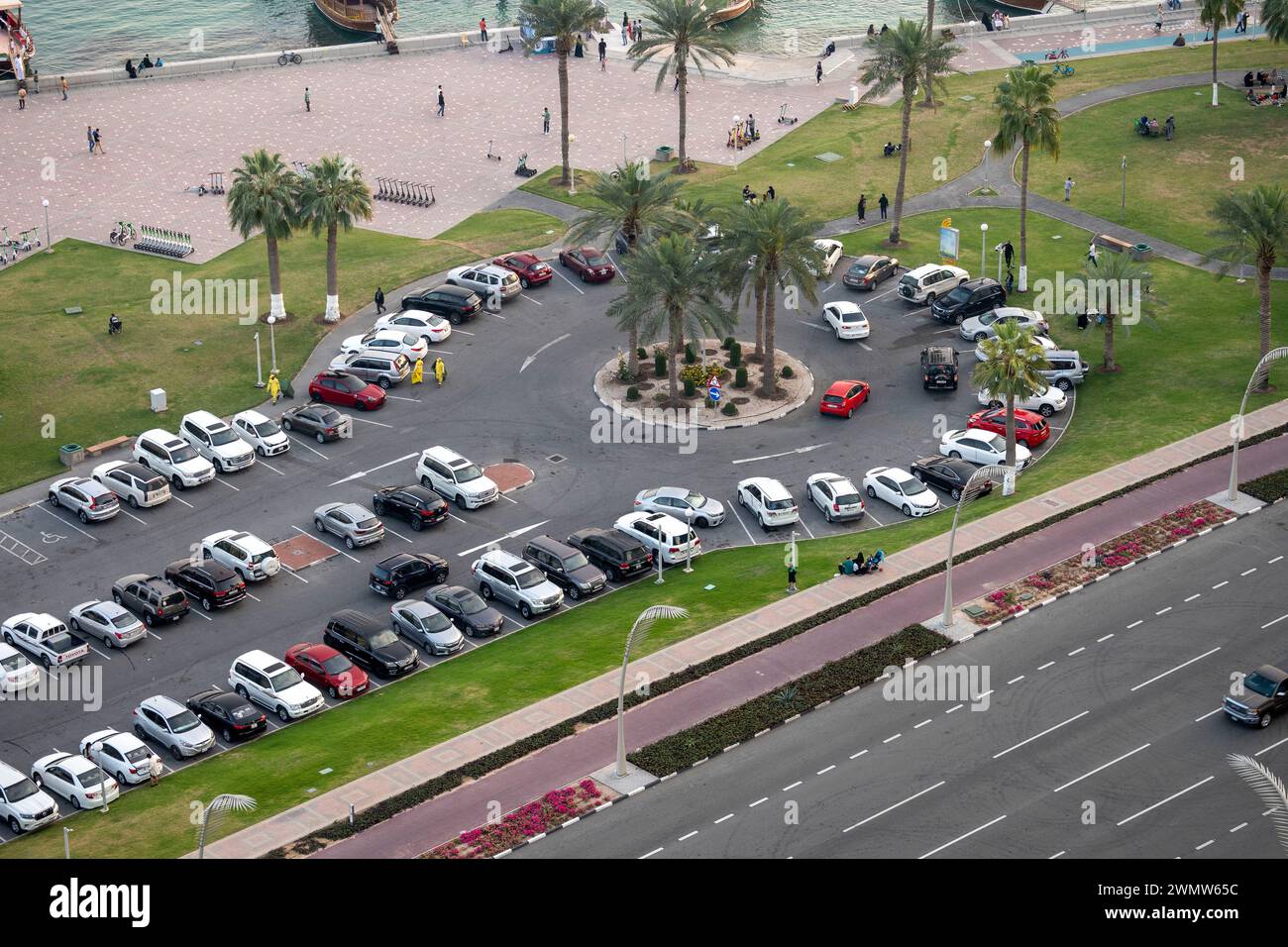 Aerial view of Doha Corniche sunset sunrise. Corniche road and traffic ...