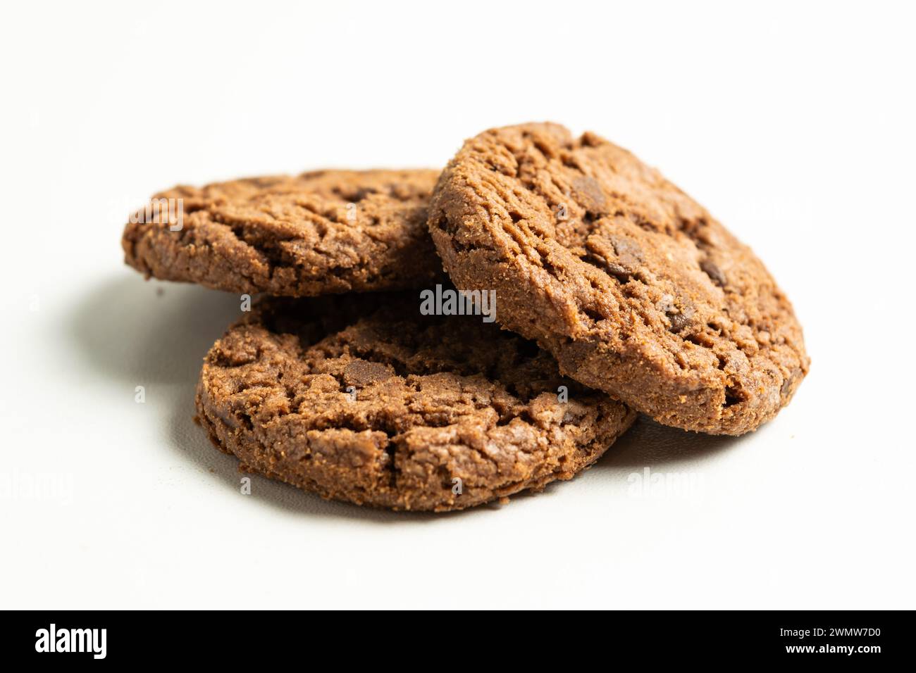 The three chocolate cookies isolated on a white background Stock Photo ...