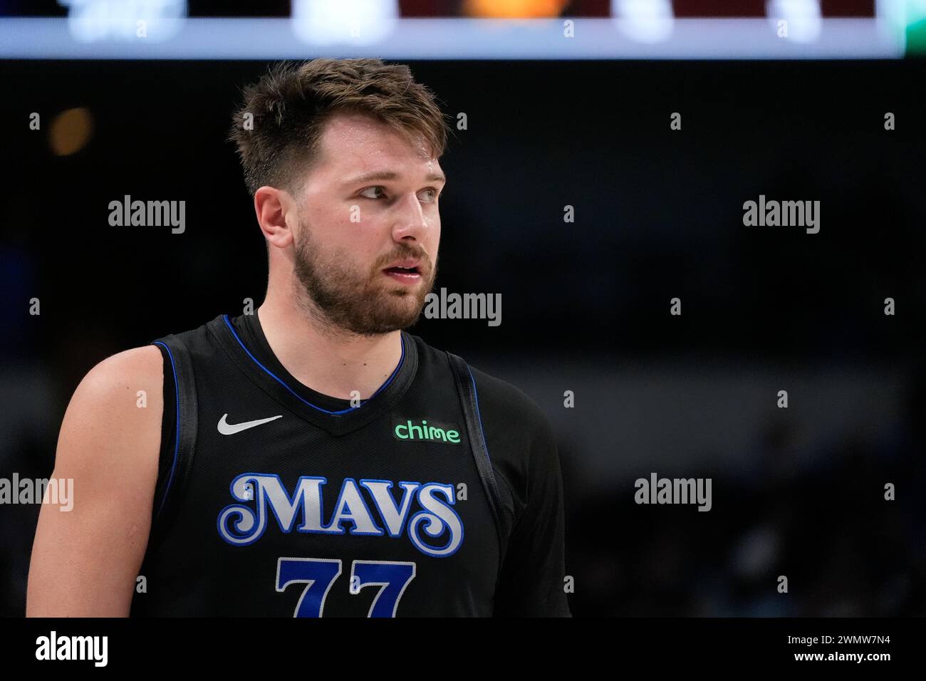 Dallas Mavericks' Luka Doncic walks across the court during an NBA ...