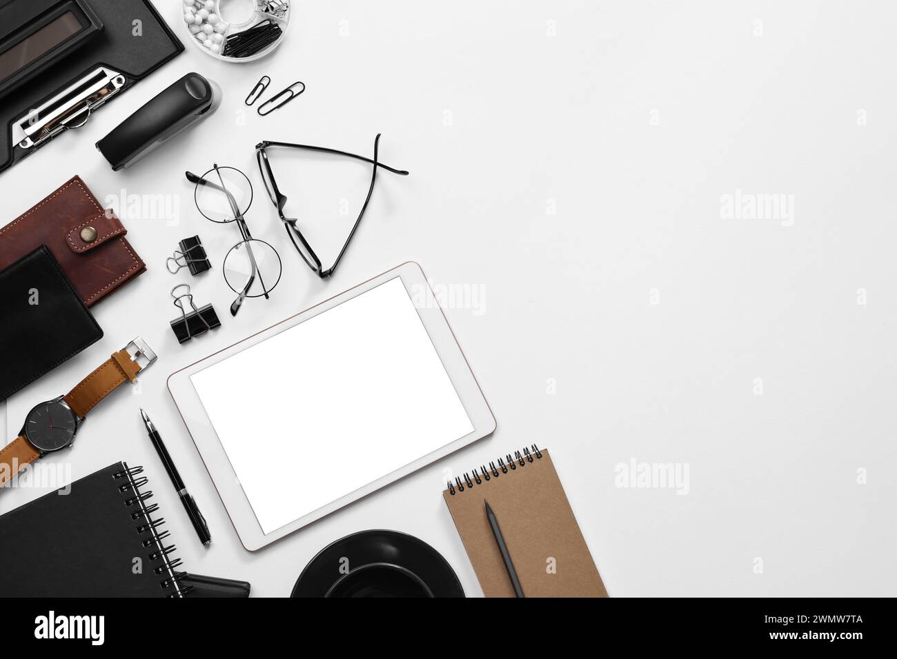 Flat lay composition with modern tablet on white background. Space for ...