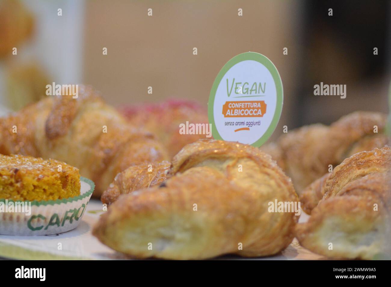 Assorted baked goods on display at a bakery Stock Photo - Alamy
