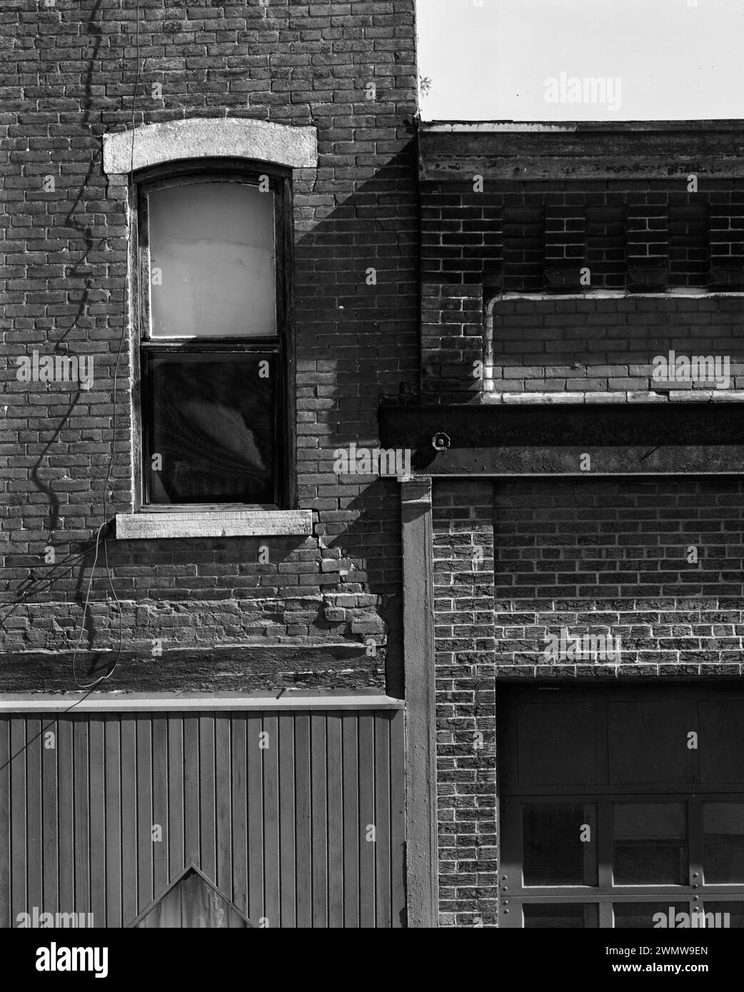 Southwest Front detail, showing cornice and storefront Lintel. View to ...