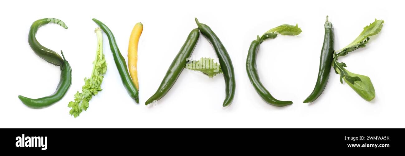 word SNACK from green chili peppers, yellow carrot, celery stick and ...