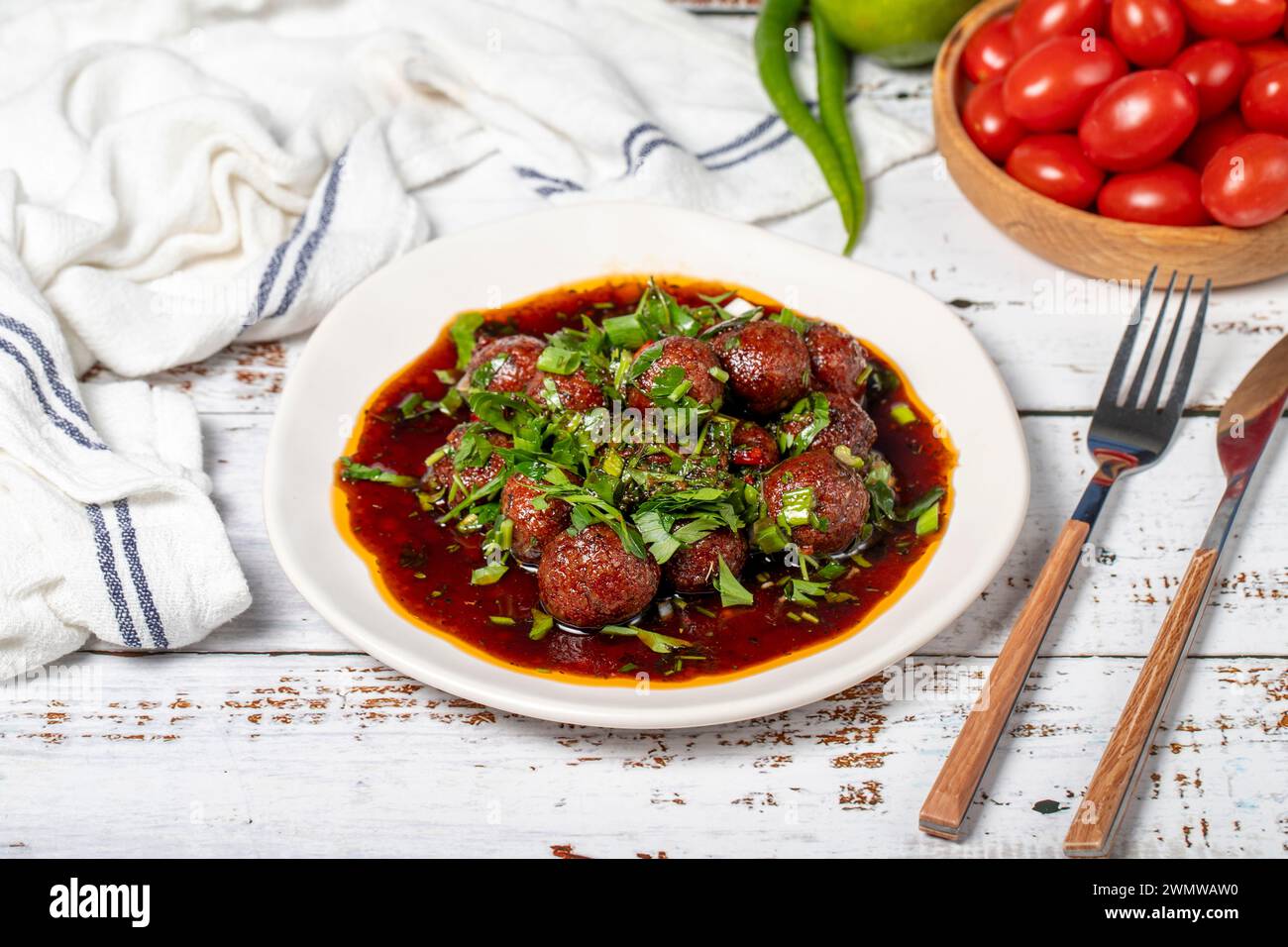 Aleppo meatballs. Traditional Asian flavors. Meatballs with tomato ...