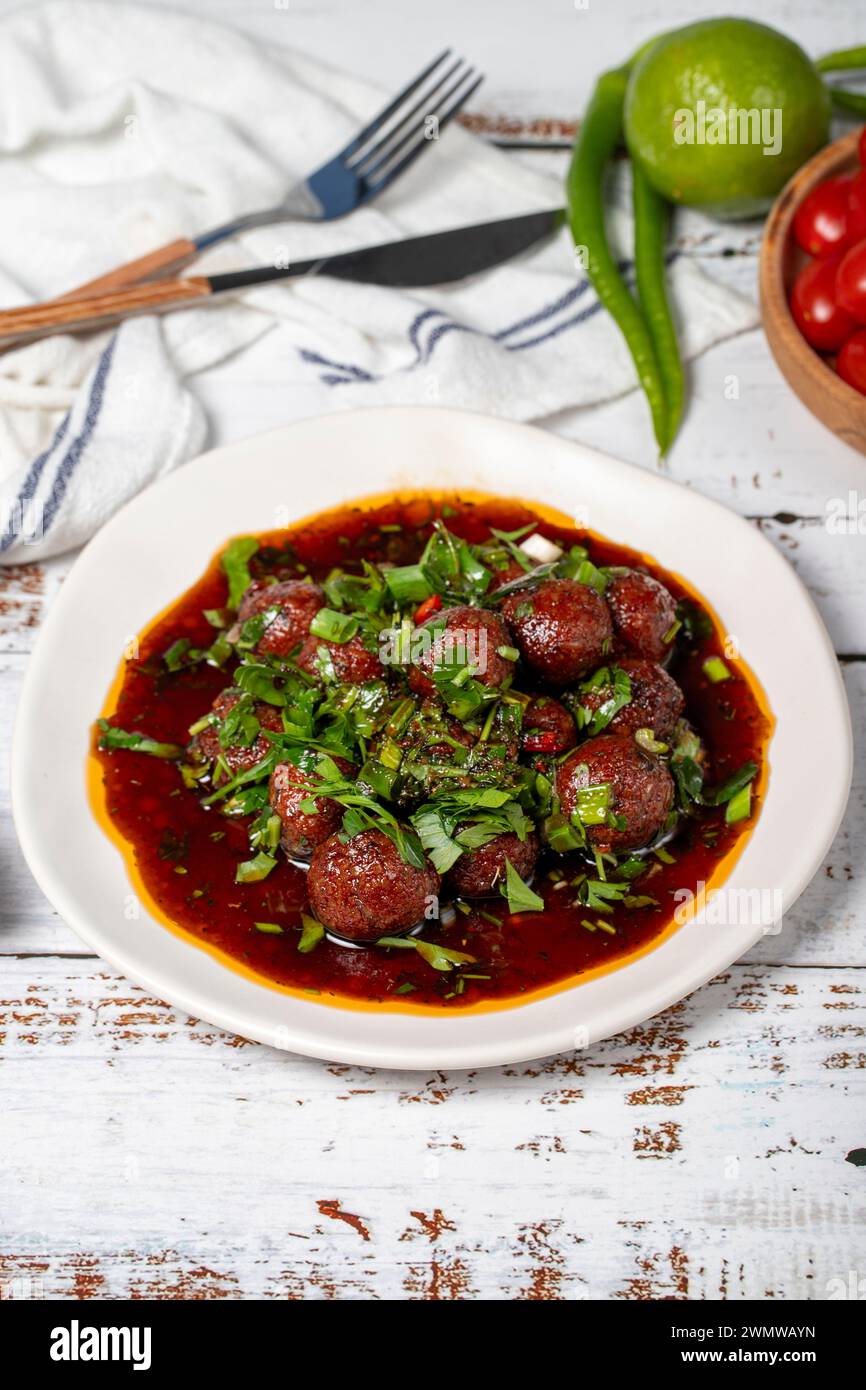 Aleppo meatballs. Traditional Asian flavors. Meatballs with tomato ...