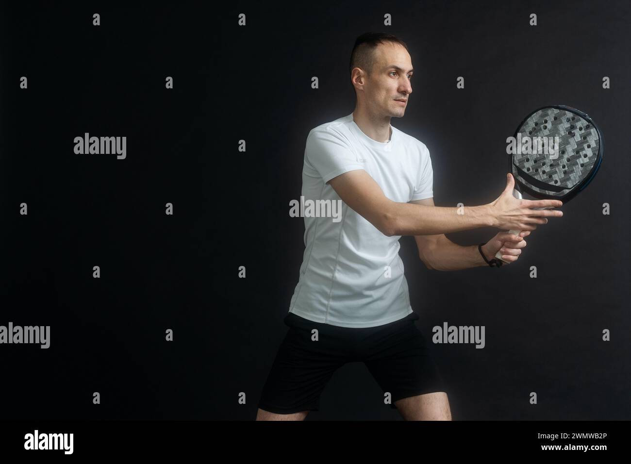 one caucasian mature man Paddle Padel tennis player shadow silhouette ...