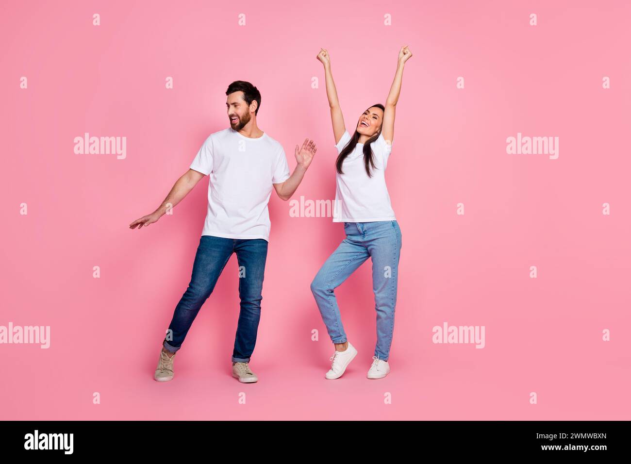 Full size photo of attractive young couple dancing have fun celebrate ...