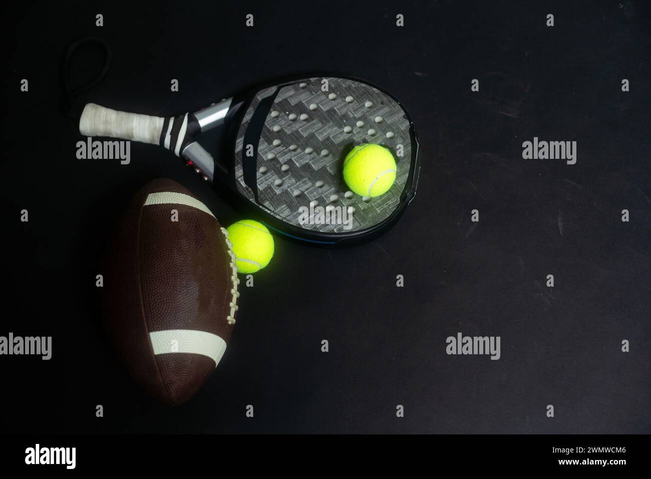 Set of sport equipment on floor, padel tennis, ball rugby Stock Photo ...