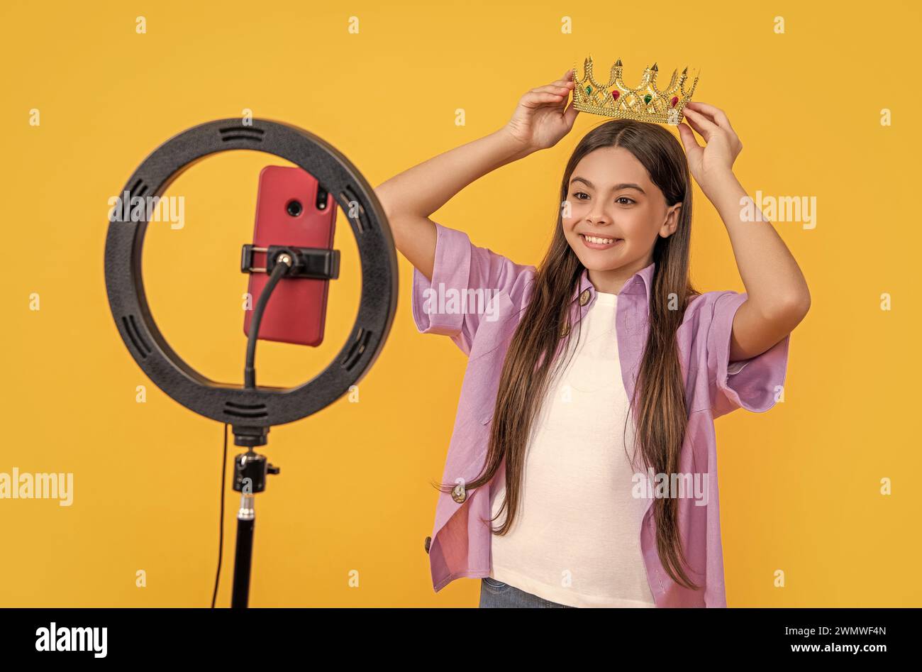 photo of positive teen blogger girl with crown. teen blogger girl with ...