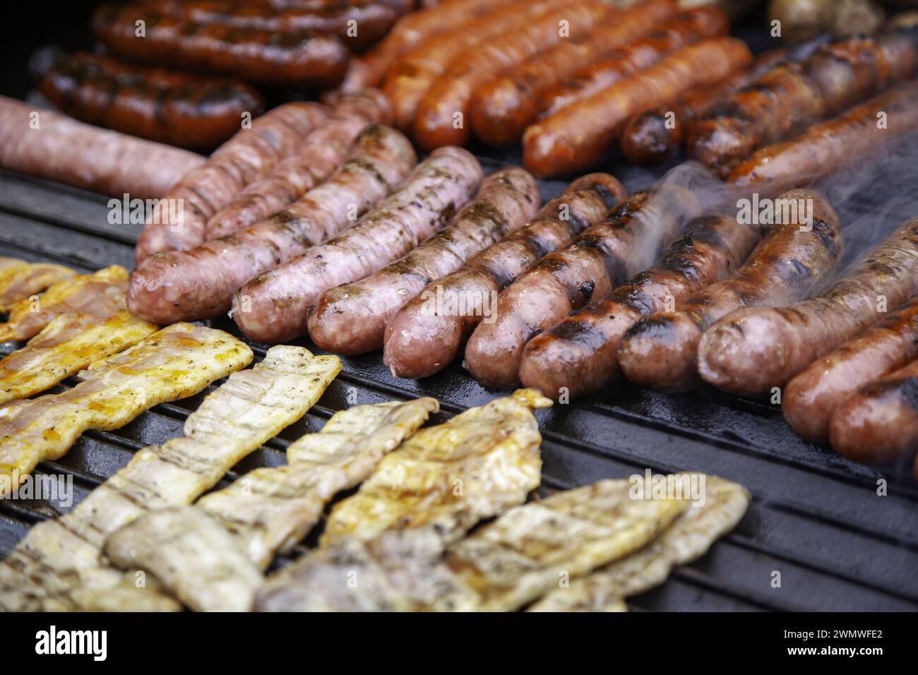 Detail of grilled roast meat, traditional food Stock Photo - Alamy