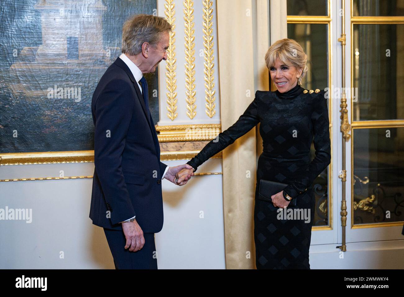 Paris, France. 27th Feb, 2024. LVMH CEO Bernard Arnault Brigitte Macron ...