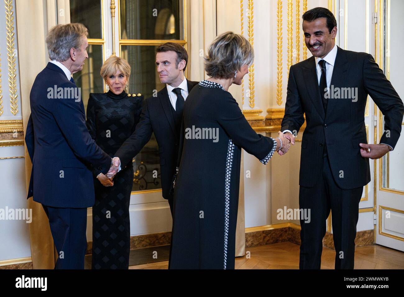 Paris, France. 27th Feb, 2024. CEO of LVMH Bernard Arnault, and his ...