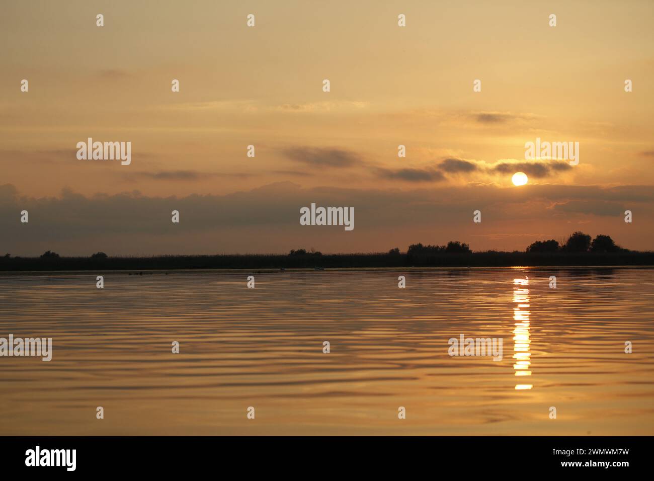 Sunset over the Danube Delta Stock Photo - Alamy