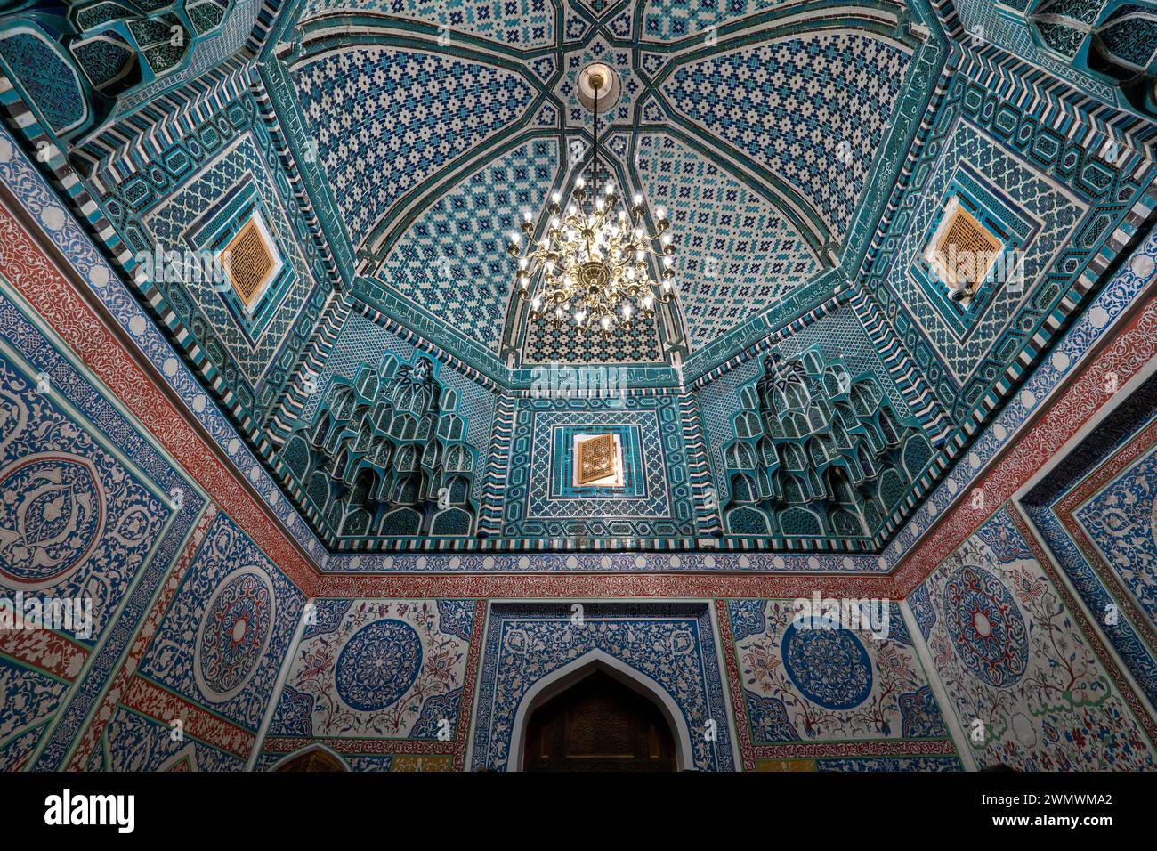 The ceiling inside the crypt or mausoleum is in the traditional Uzbek ...