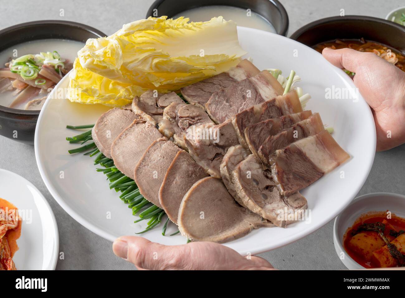 Korean food dish Beef head gukbap, boiled pork, beef, yukgyejang, side ...