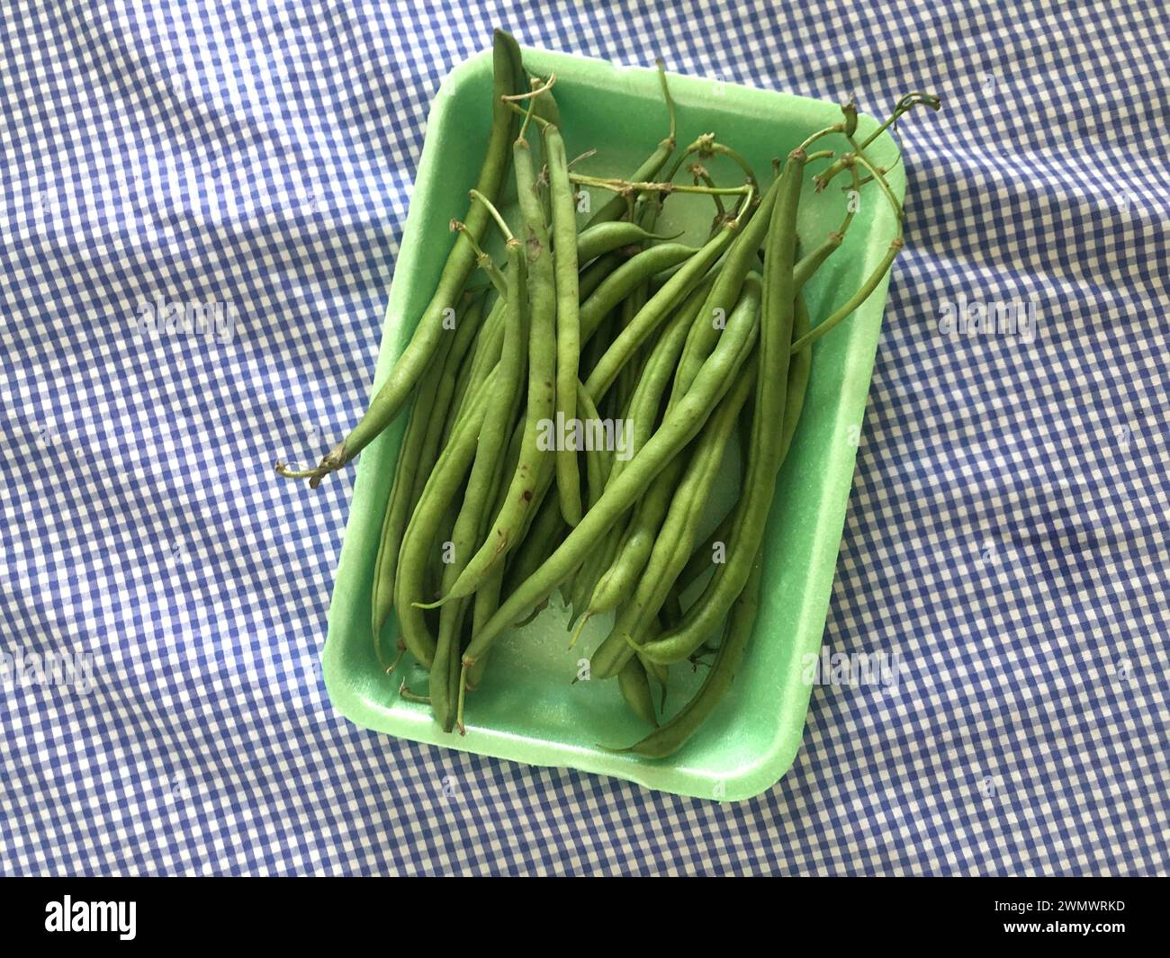 Bunch of green pods of raw, uncooked beans grains, top view Stock Photo ...