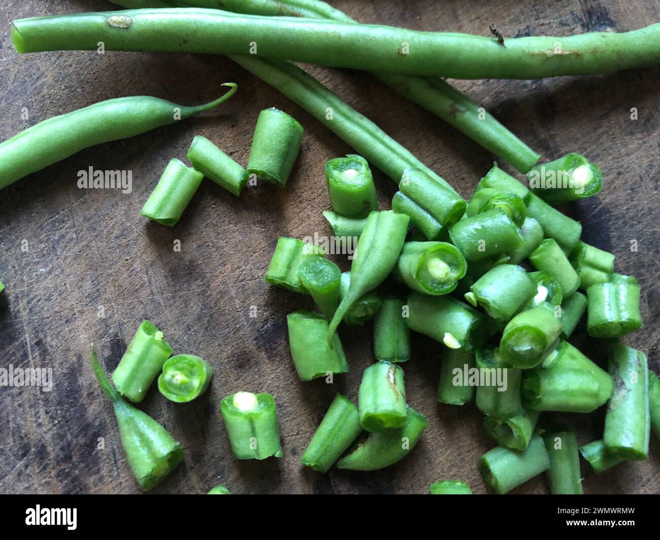 Bunch of green pods of raw, uncooked beans grains, top view Stock Photo ...