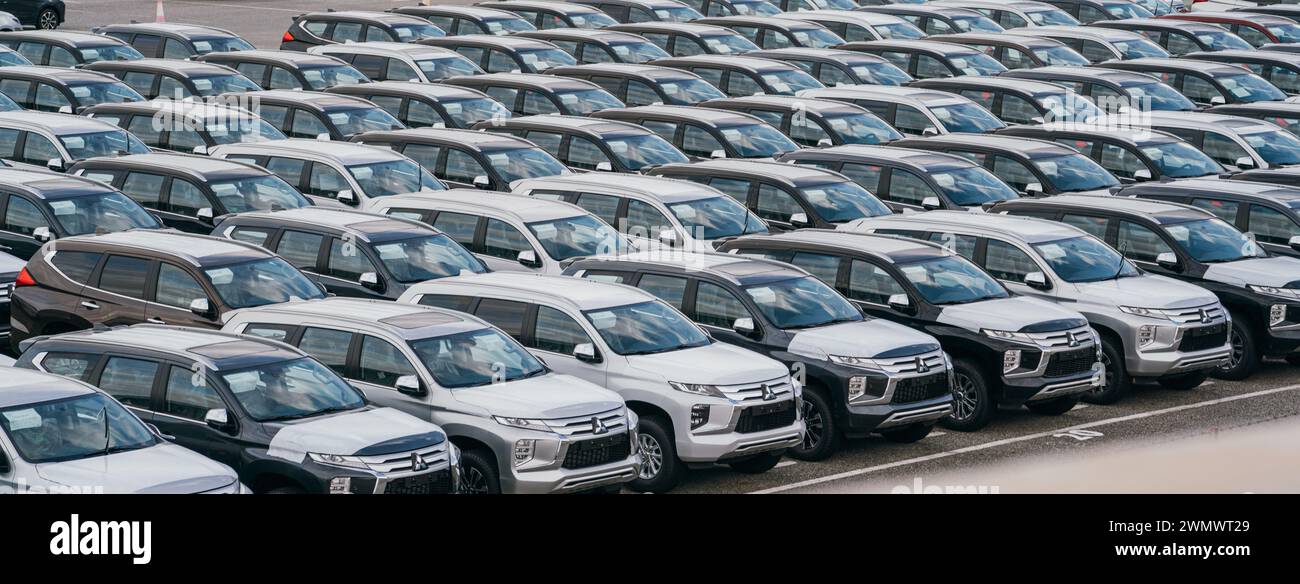 Witness the seamless parking and transportation of new hatchbacks from ...