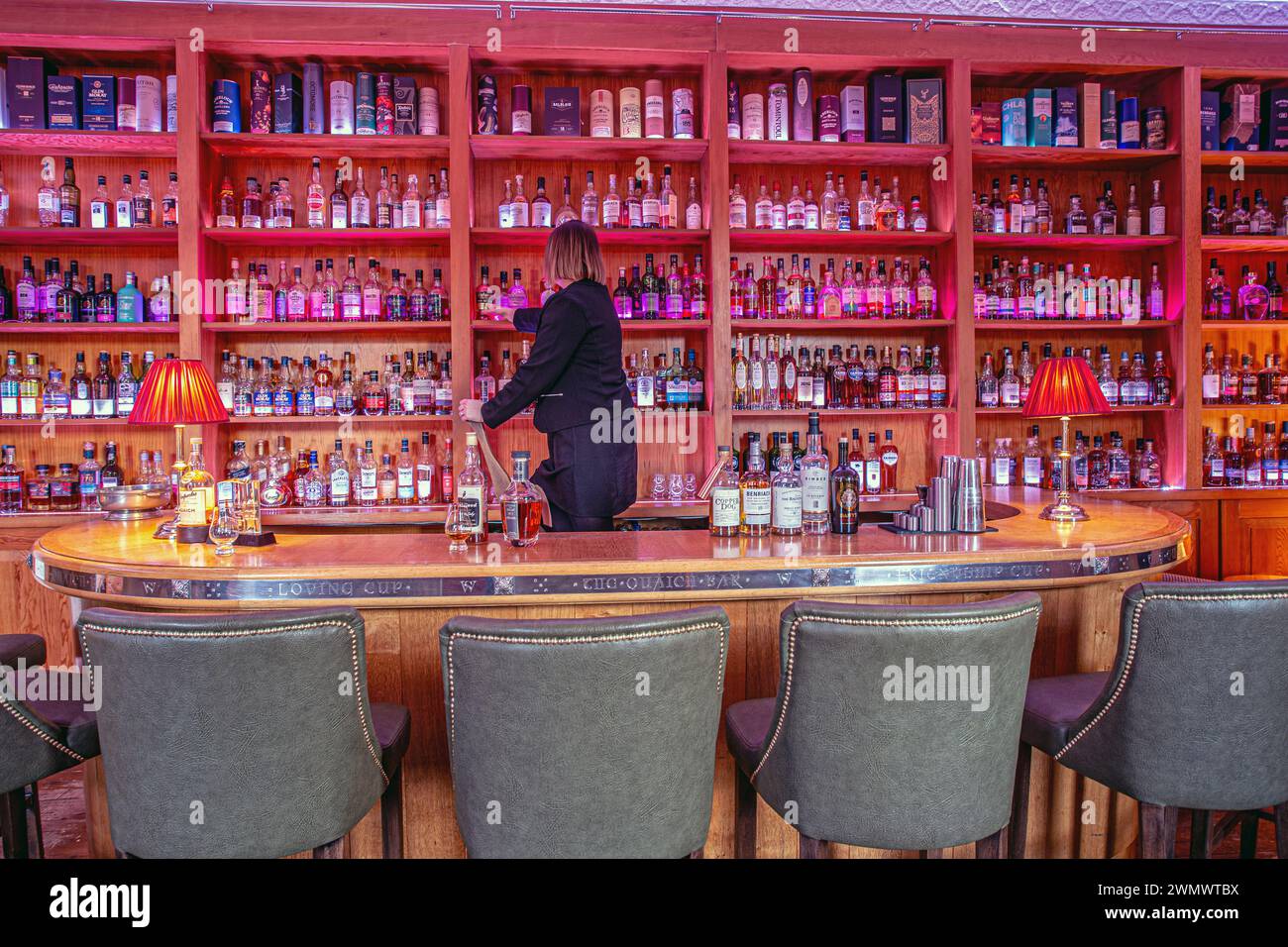 The Cooper Dog bar in the Craigellachie Hotel lined with Whisky bottles ...