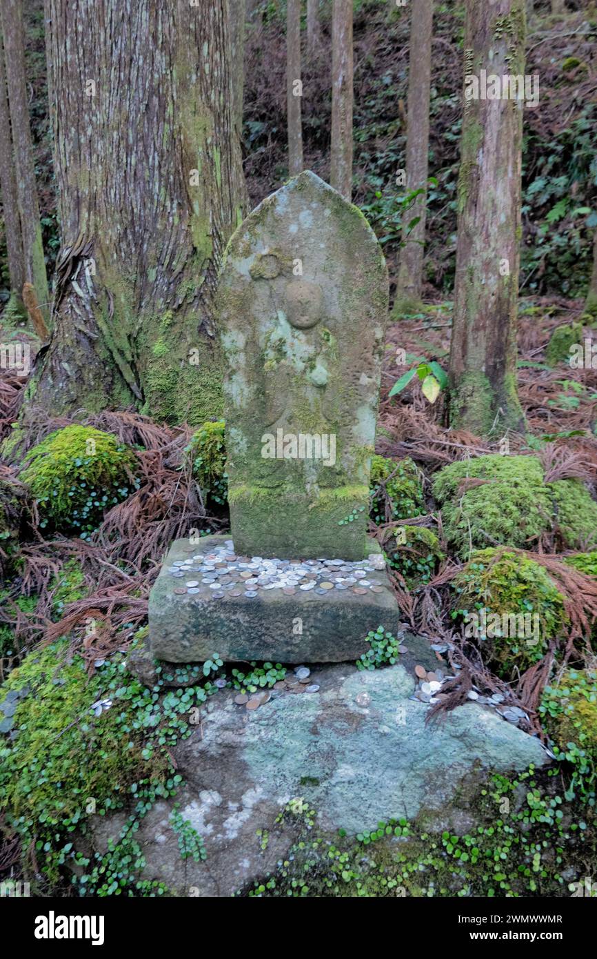 Forest jizo stone statue on the Kumano Kodo Nakahechi pilgrimage route ...
