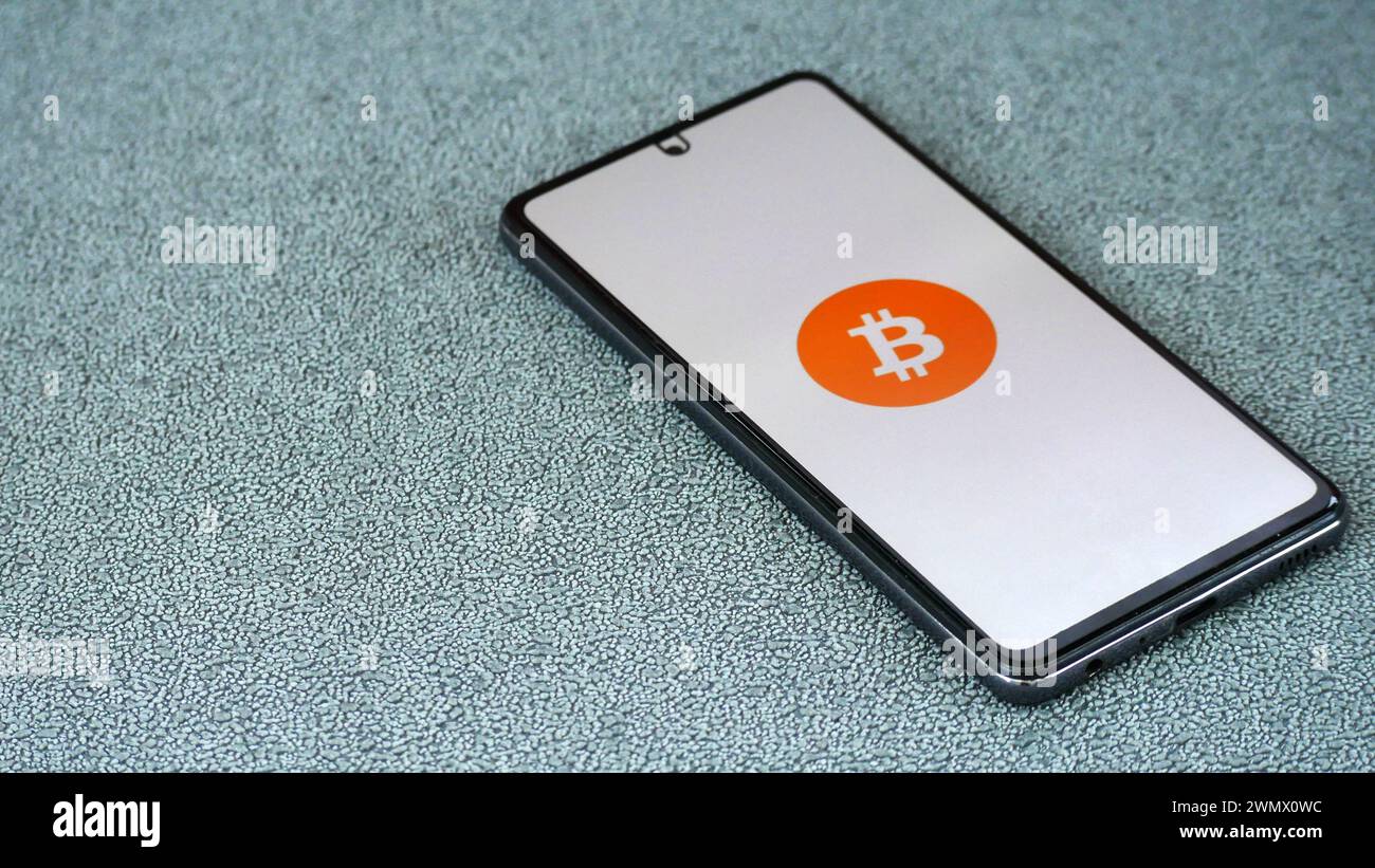 Bitcoin logo on smartphone screen. Virtual cryptocurrency concept 2025 ...