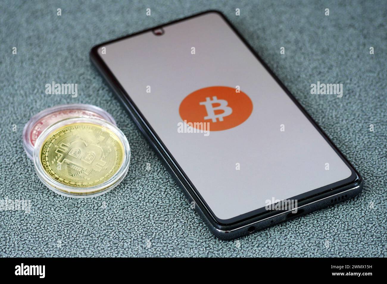 Bitcoin logo on smartphone screen. Virtual cryptocurrency concept 2025 ...