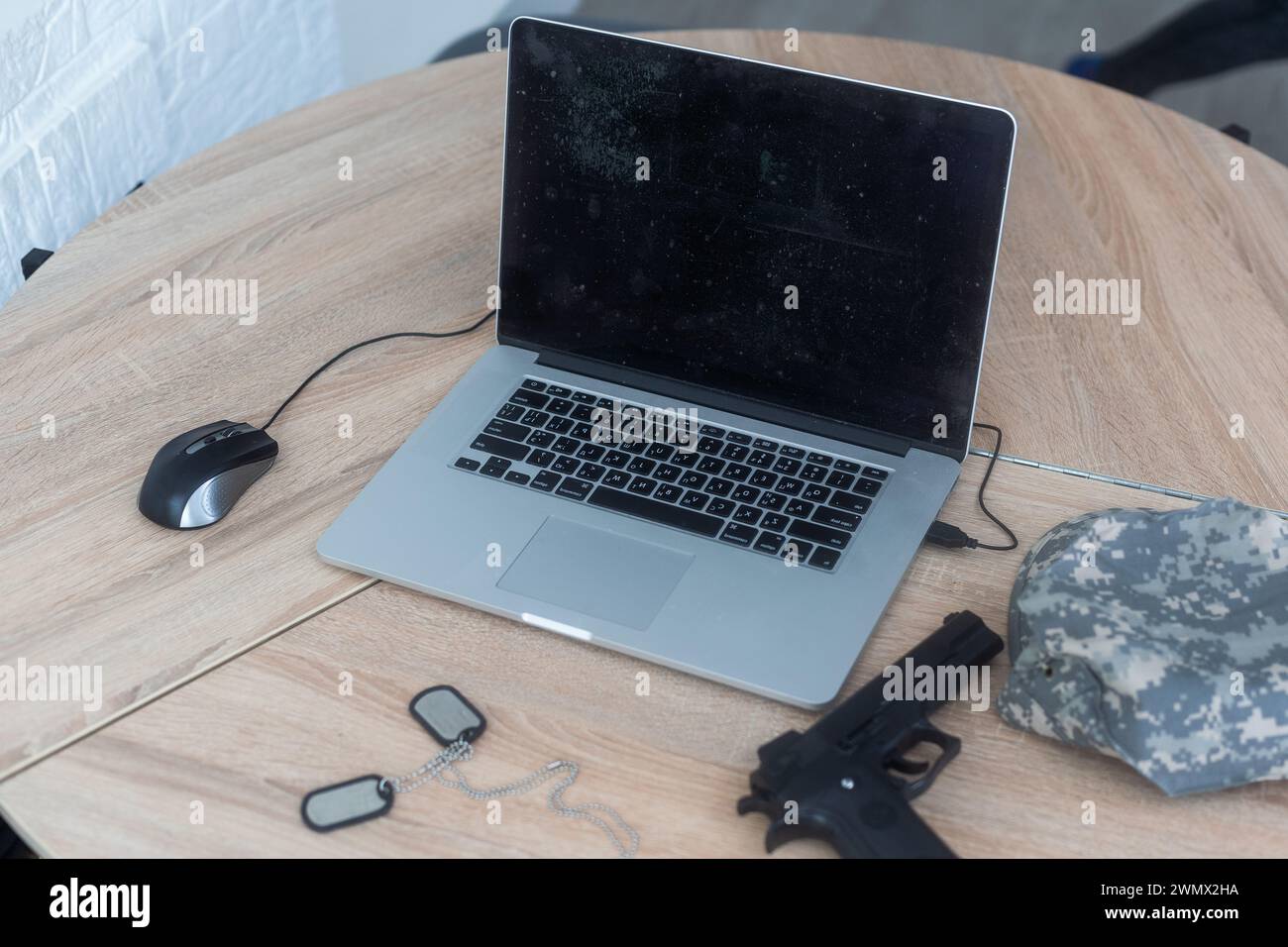 military uniform weapons and laptop on the table Stock Photo - Alamy